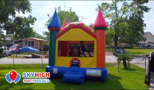 USA Multi Color Castle Moonwalk Rentals | Sky High Party Rentals